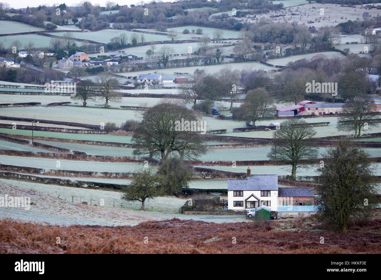 Rural farm house surrounded by frozen fields during a morning frost ...