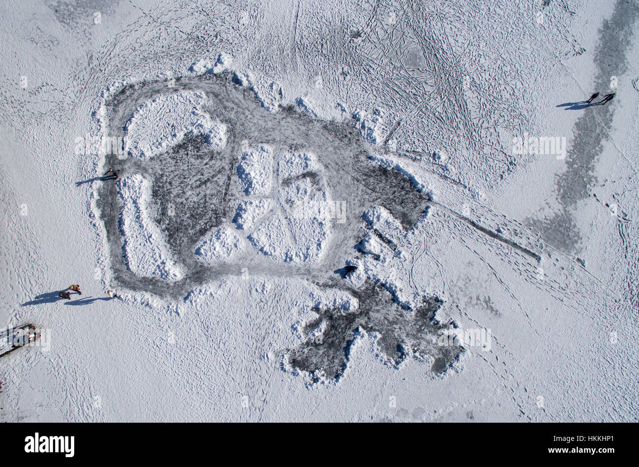 People stroll over the frozen surface of the Weßlinger Lake in Weßling ...