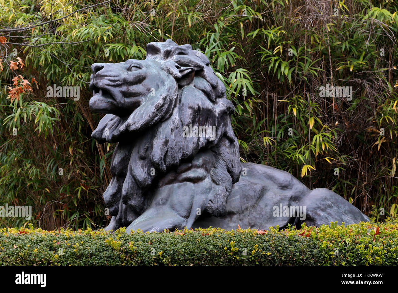 A lion statue guards the main entrance to the Smithsonian National Zoo ...