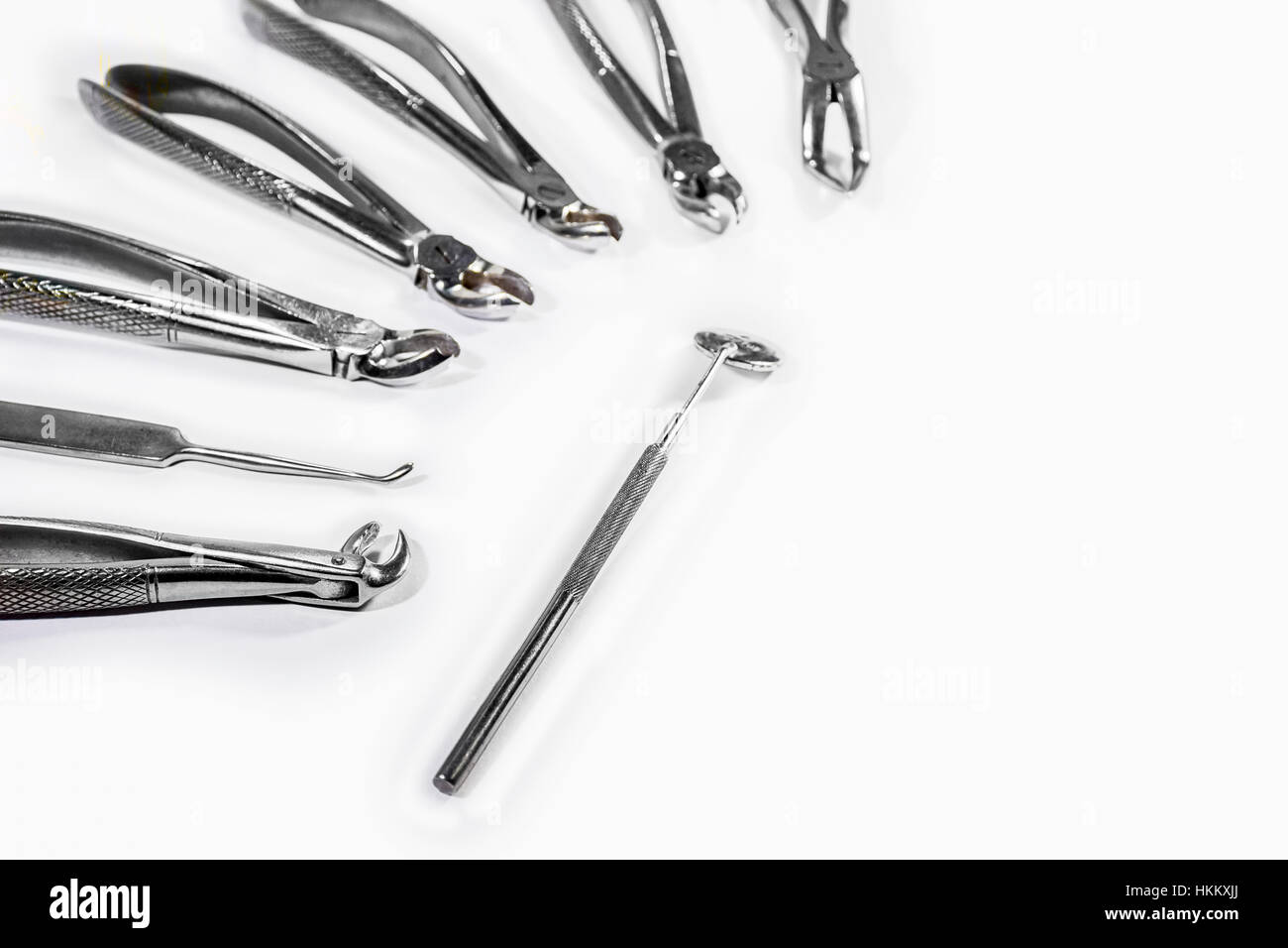 Dental Instruments arranged on white table.isolated on white.concept of ...