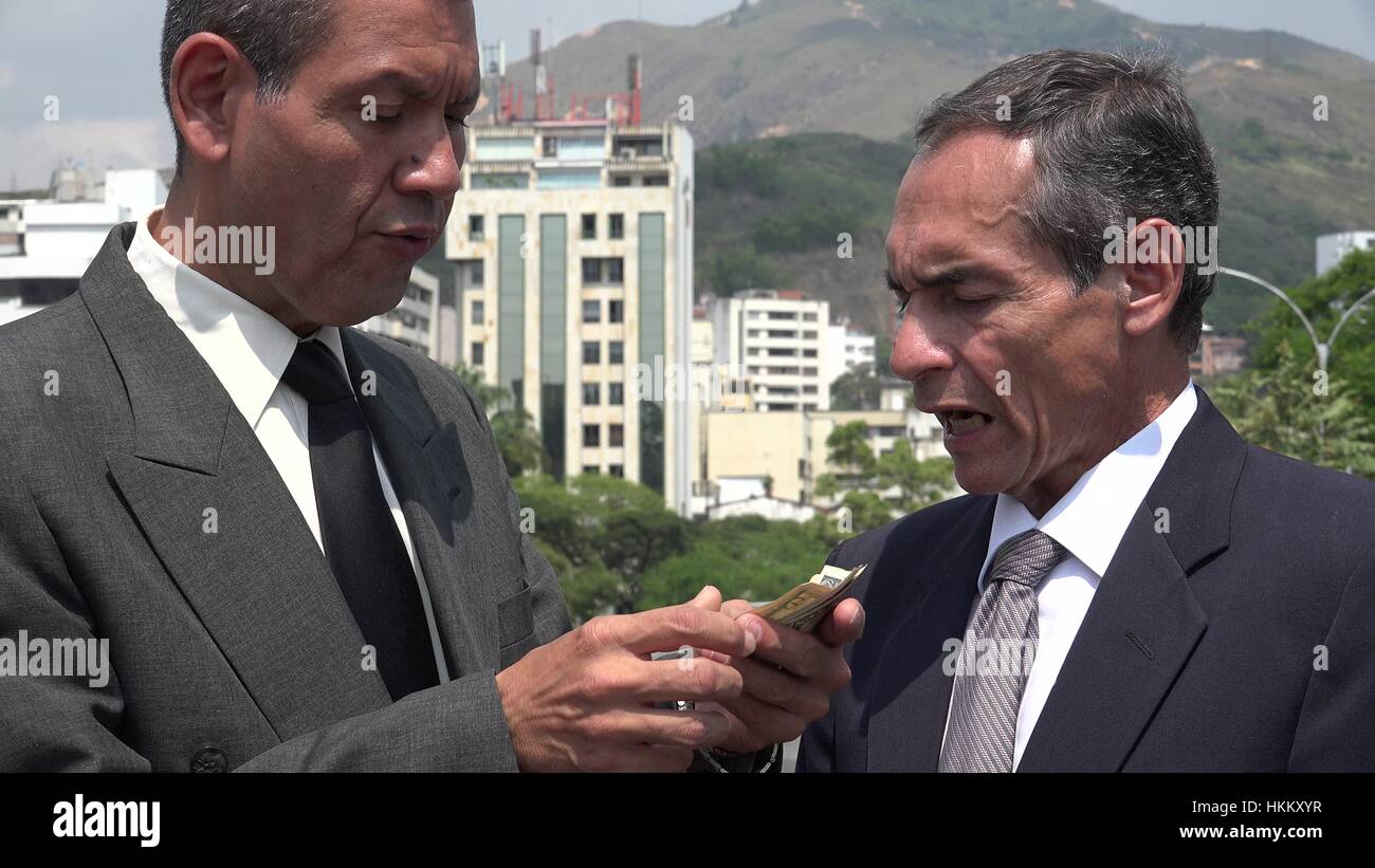 Business Men Handling Money Stock Photo - Alamy