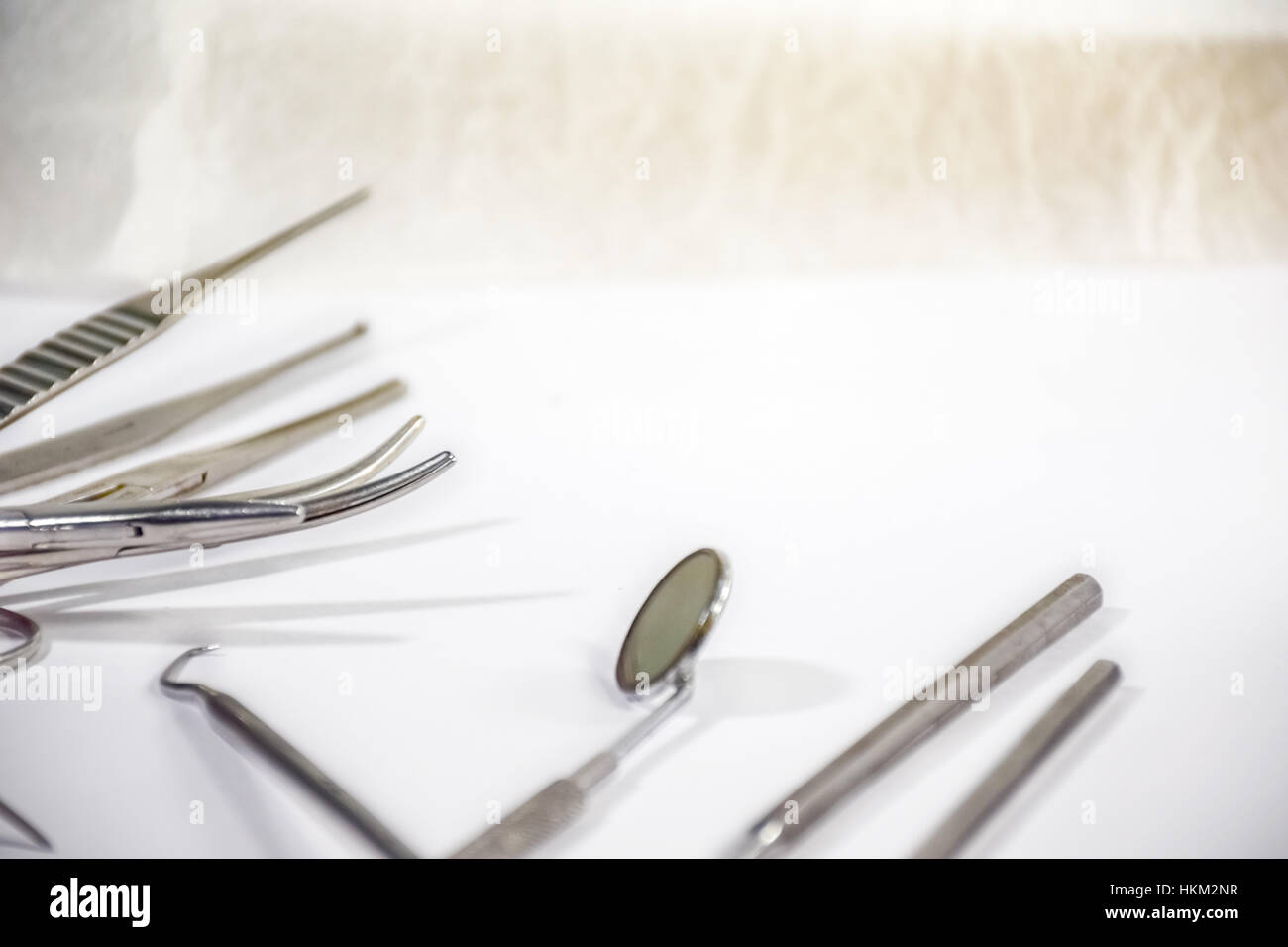 Dental Instruments arranged on white table.isolated on white.concept of ...