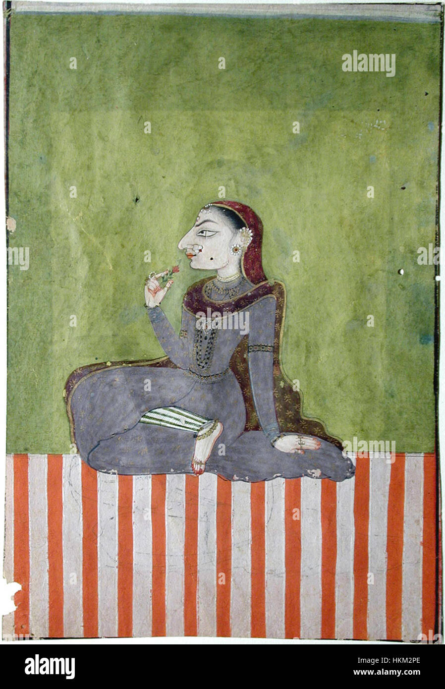 This delicate painting titled *A Princess Smells a Flower* depicts a ...