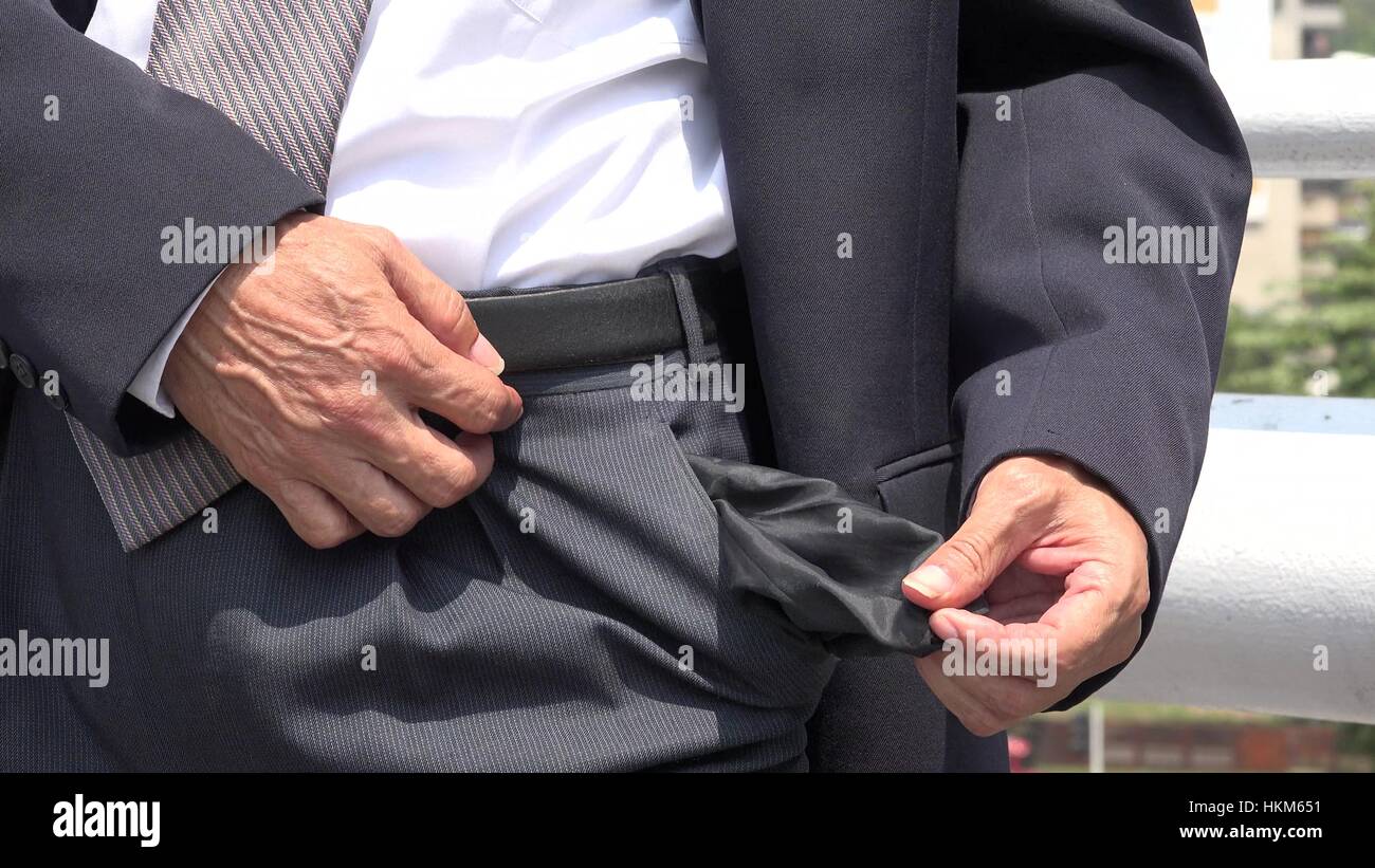 Poor Business Man With No Money Stock Photo - Alamy
