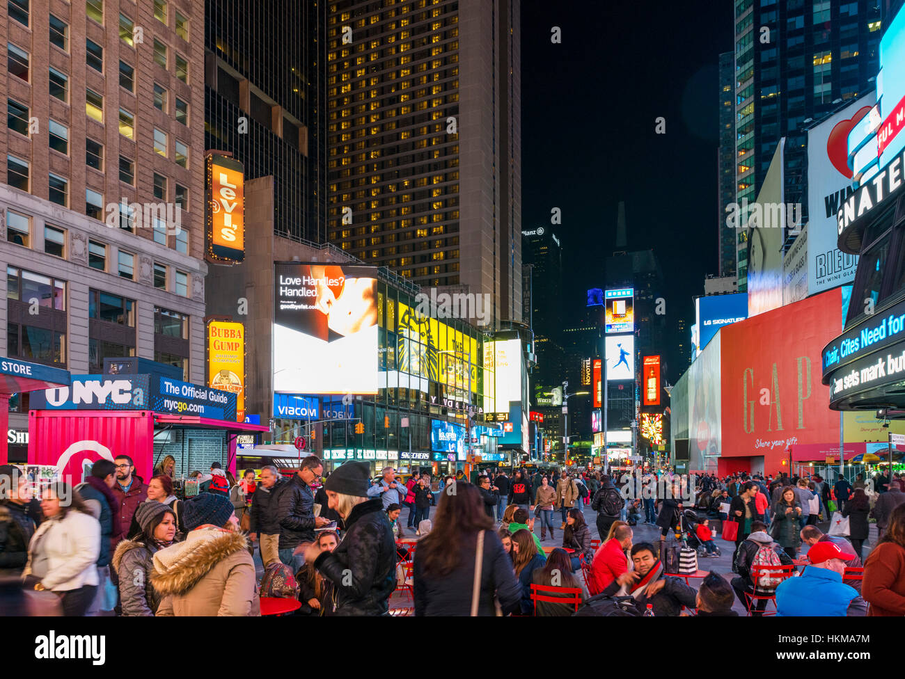 Times Square, New York City. Crowds in Times Square on a fall evening ...