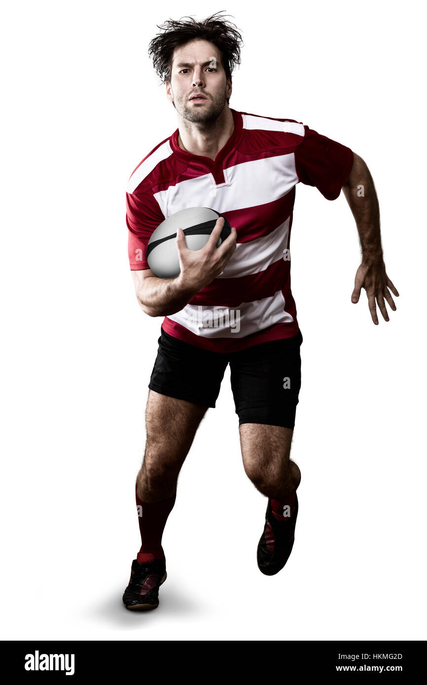 Rugby player in a red uniform running. White Background Stock Photo - Alamy