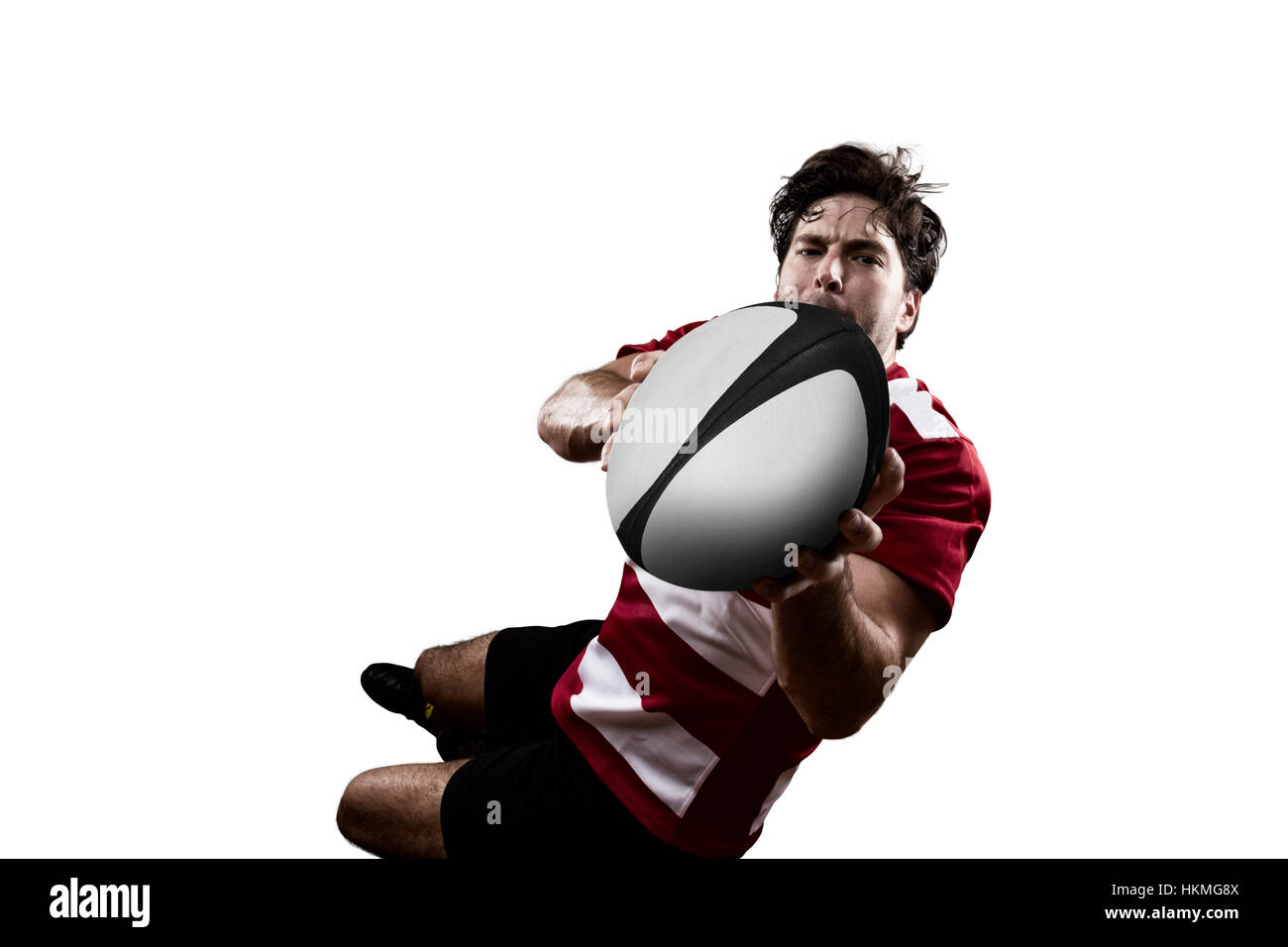 Rugby player in a red uniform. White Background Stock Photo - Alamy