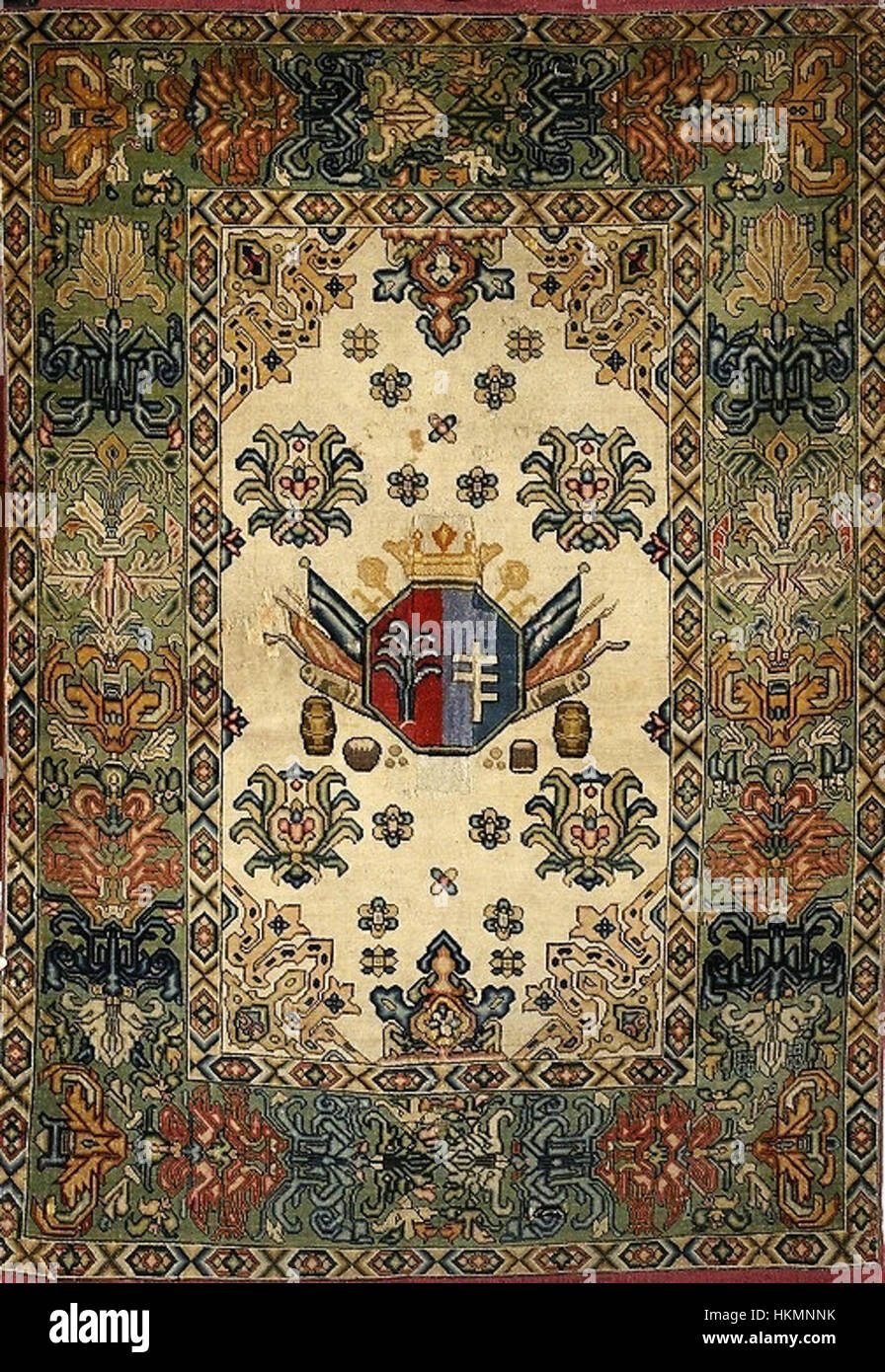 This artwork represents a detailed *Polish carpet* featuring various ...