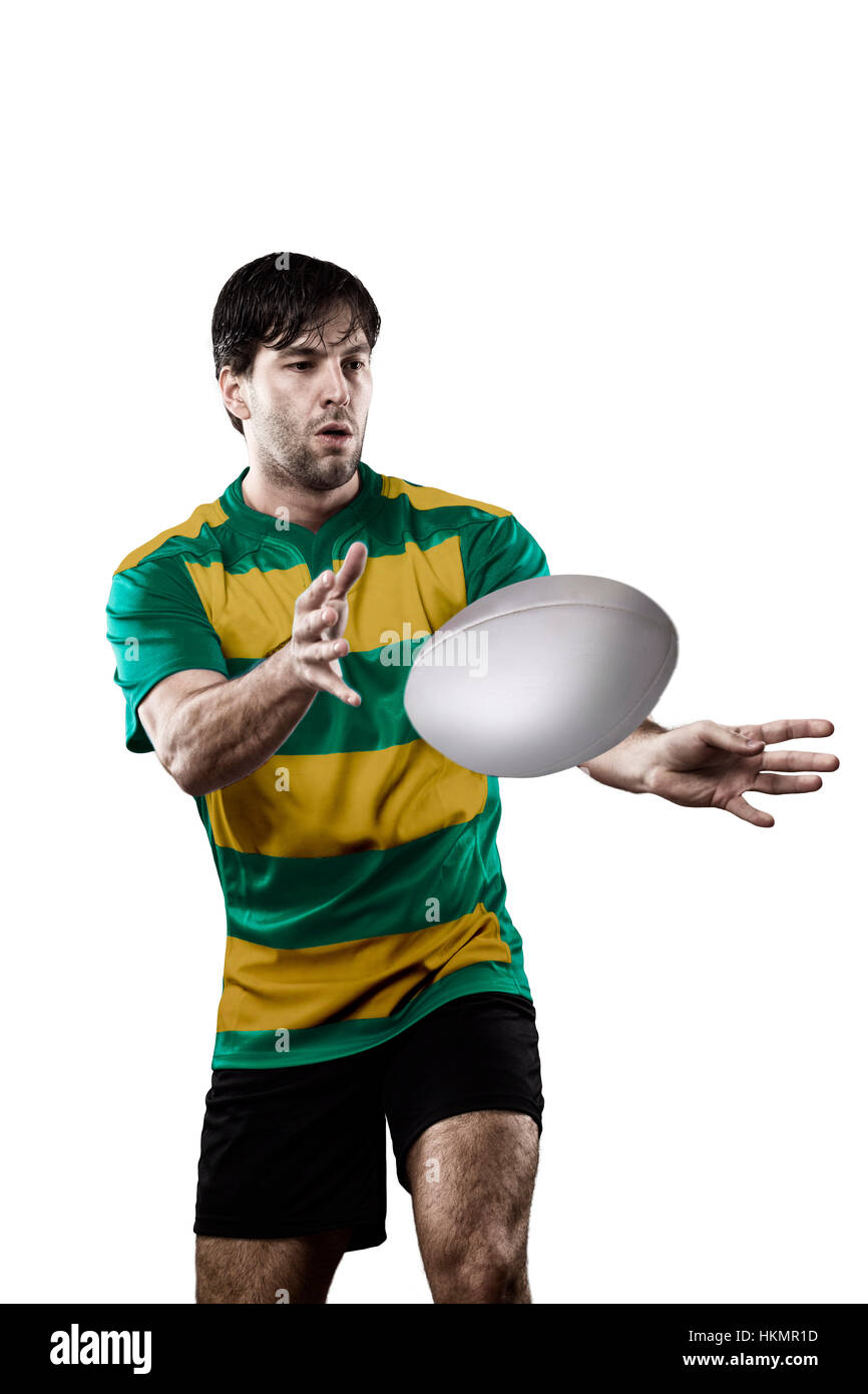 Rugby player in a green and gold uniform. White Background Stock Photo ...