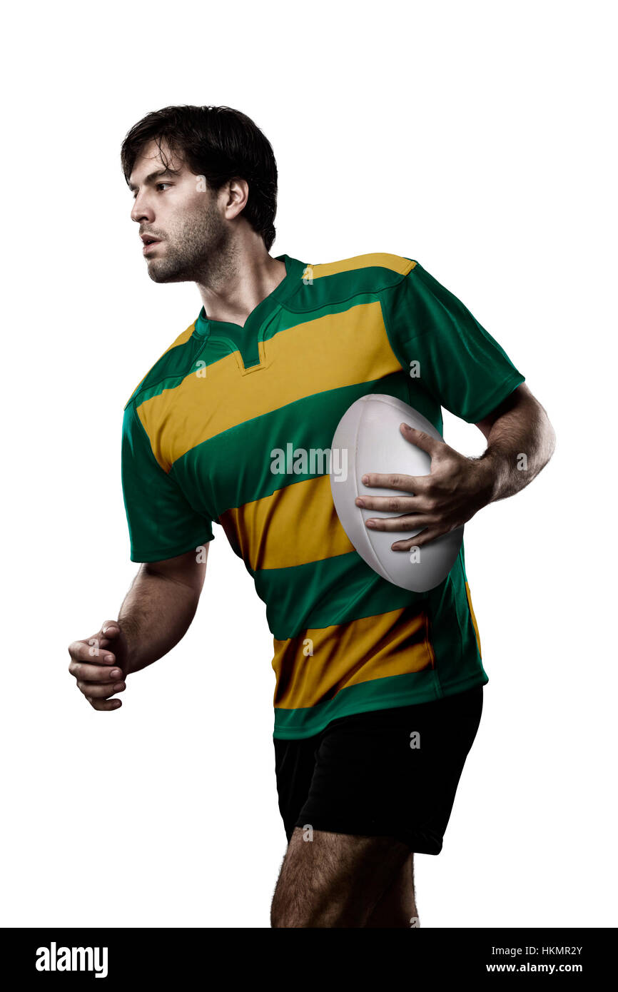 Rugby player in a green and gold uniform. White Background Stock Photo ...