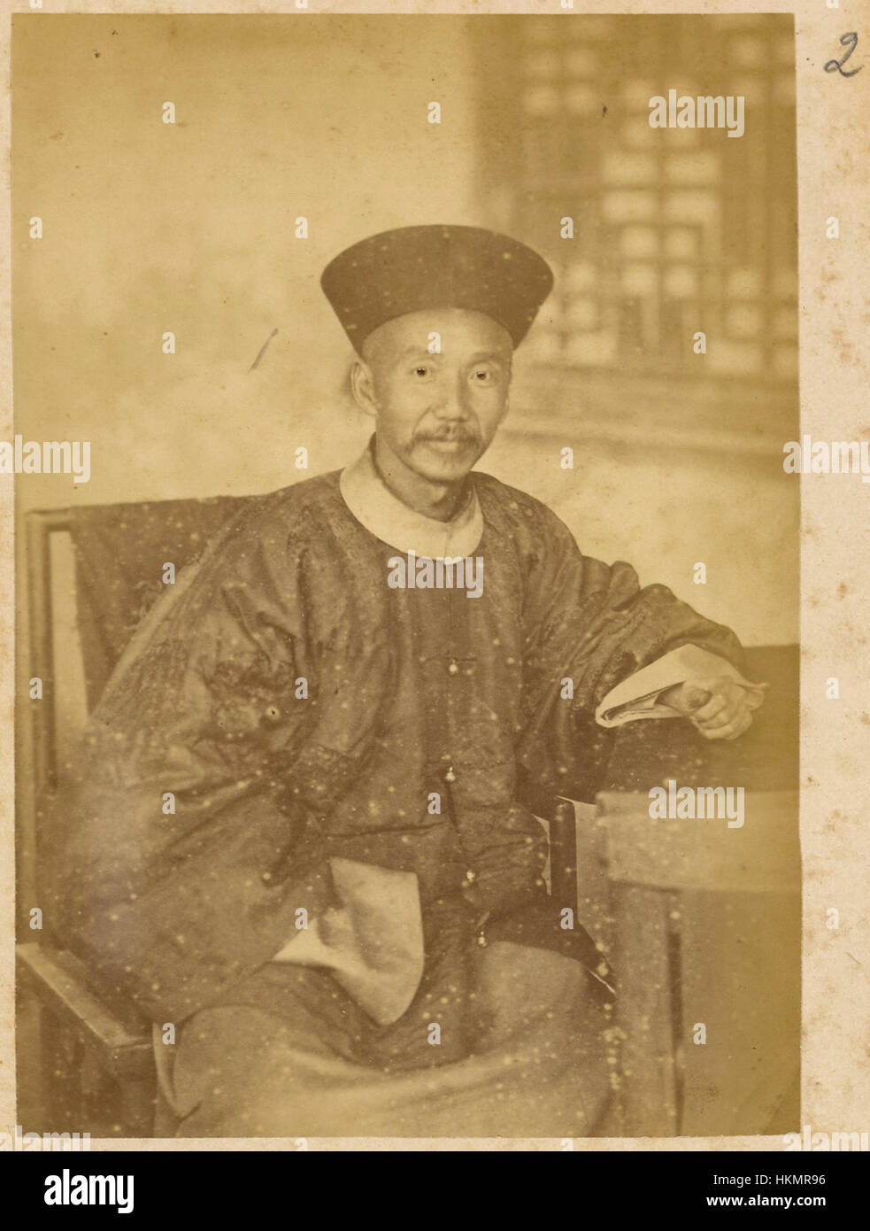 A Chinese Man in Silk Brocade Jacket and Plain Gown. China, 1874-75 ...