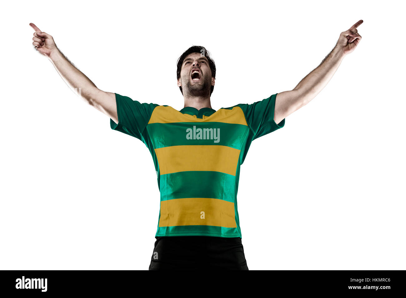 Rugby player in a green and gold uniform celebrating. White Background ...