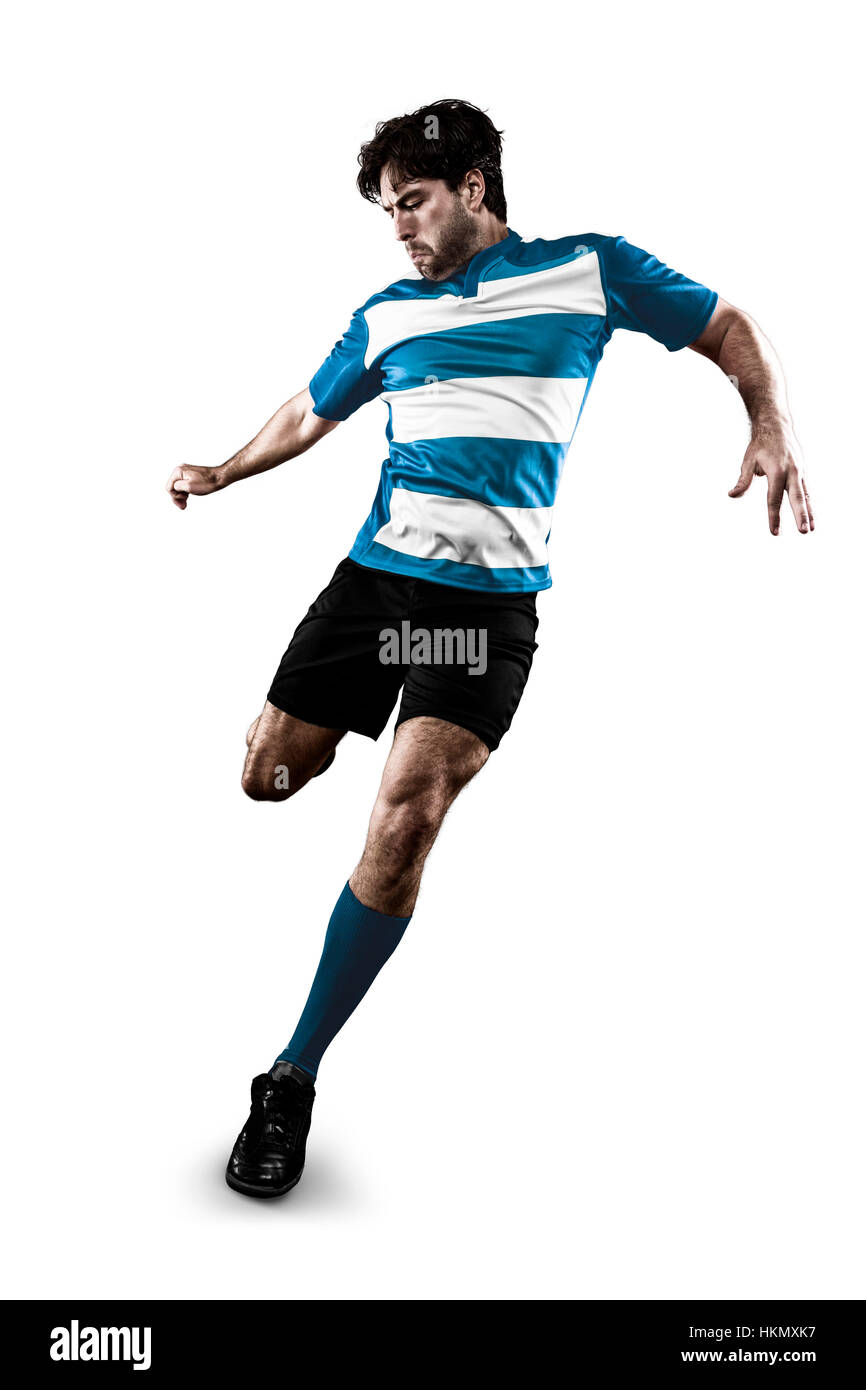 Rugby player in a blue uniform kicking. White Background Stock Photo ...