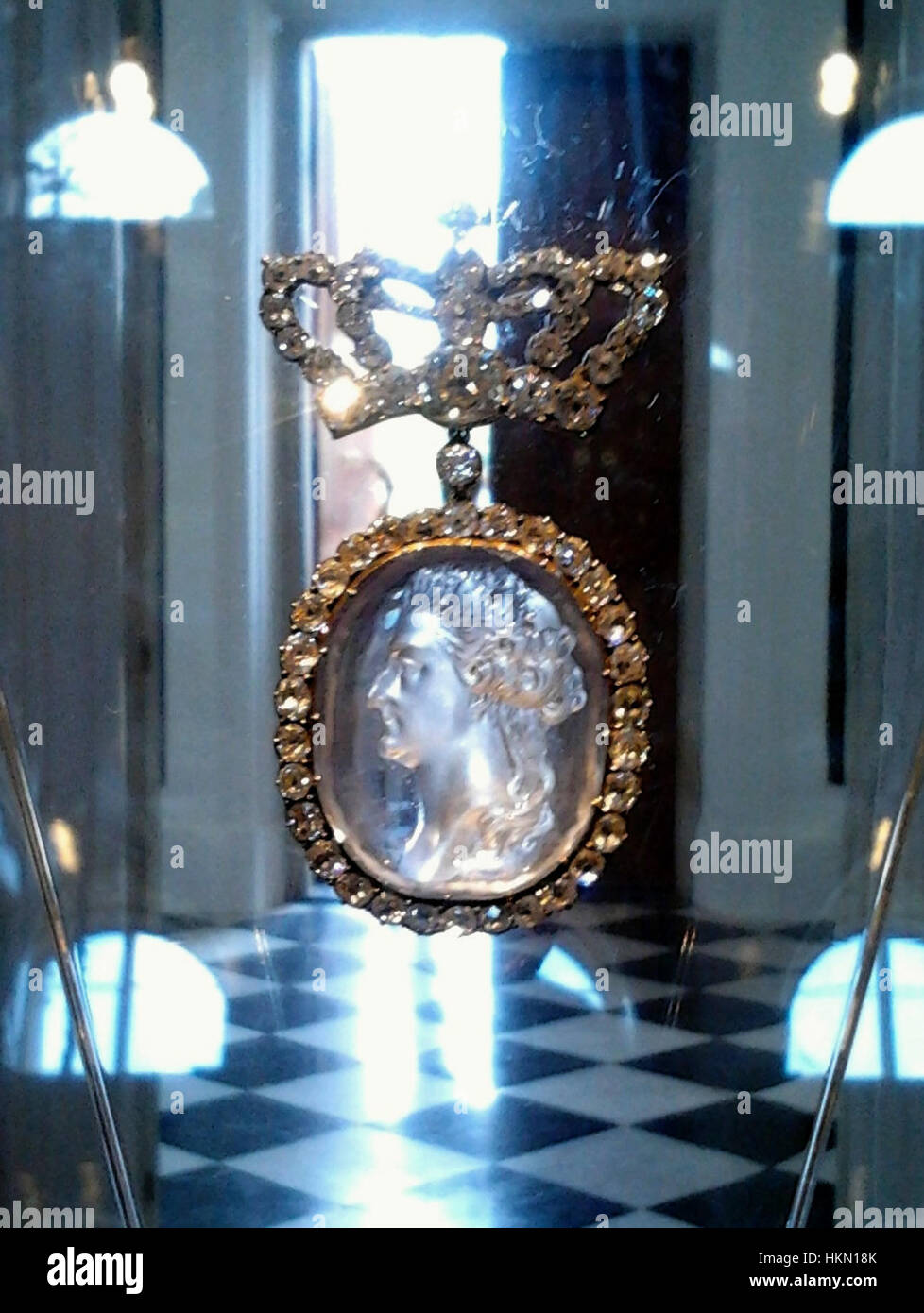 This artwork depicts a jewel designed by Regulski, incorporating an ...