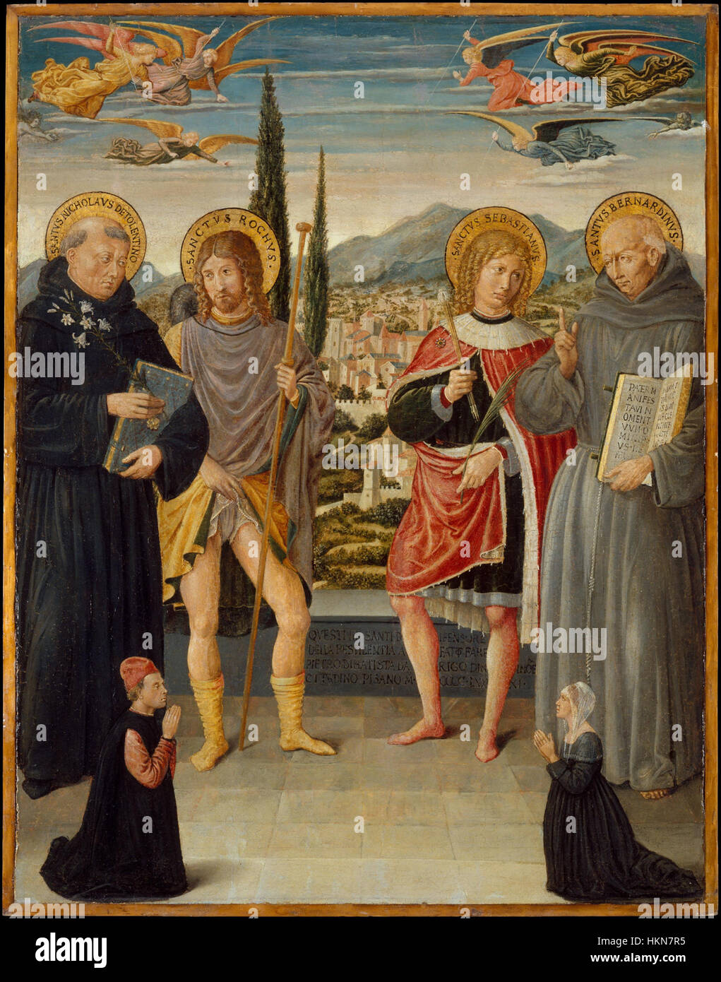 This painting by Benozzo Gozzoli depicts Saints Nicholas of Tolentino ...