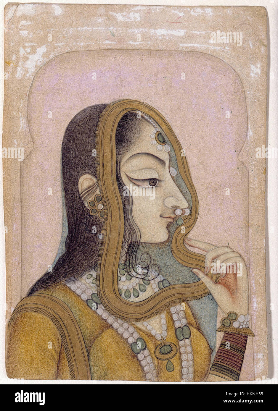 This portrait features a beautiful woman framed by an arch ...