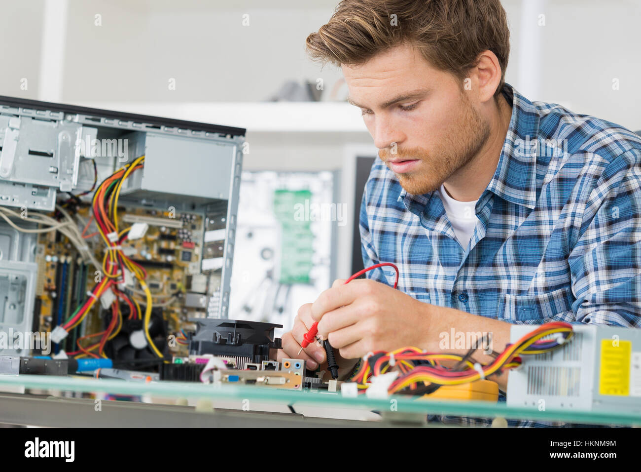 computer engineer fixing motherboard Stock Photo - Alamy