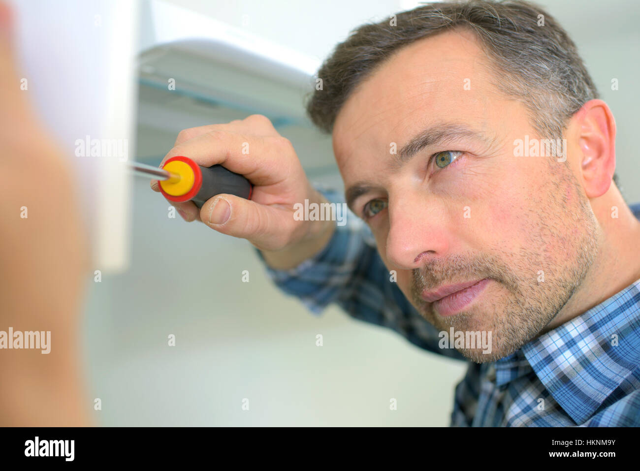 Male doing diy hi-res stock photography and images - Alamy