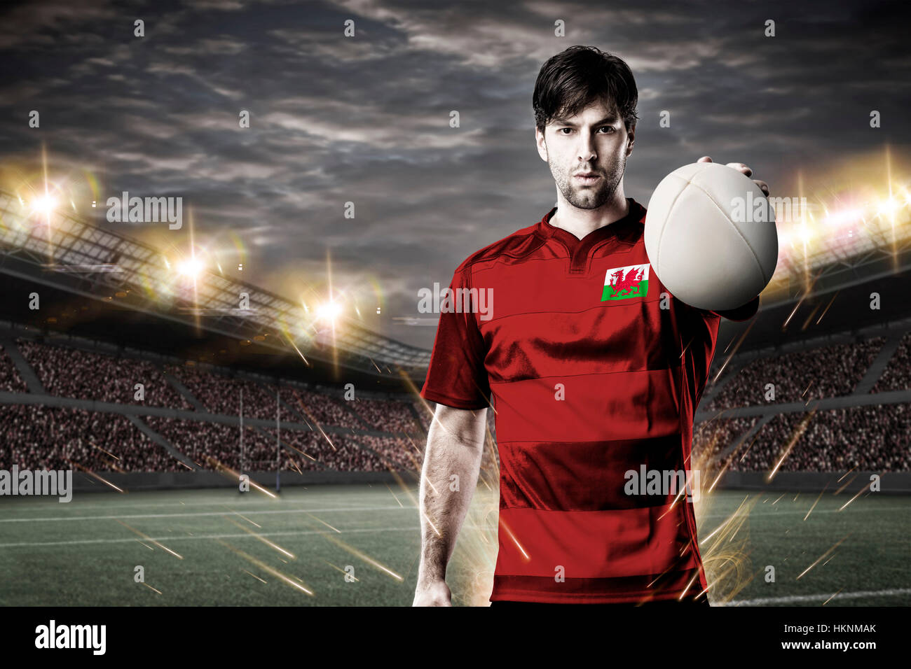 Welsh rugby player, wearing a red uniform in a stadium Stock Photo - Alamy