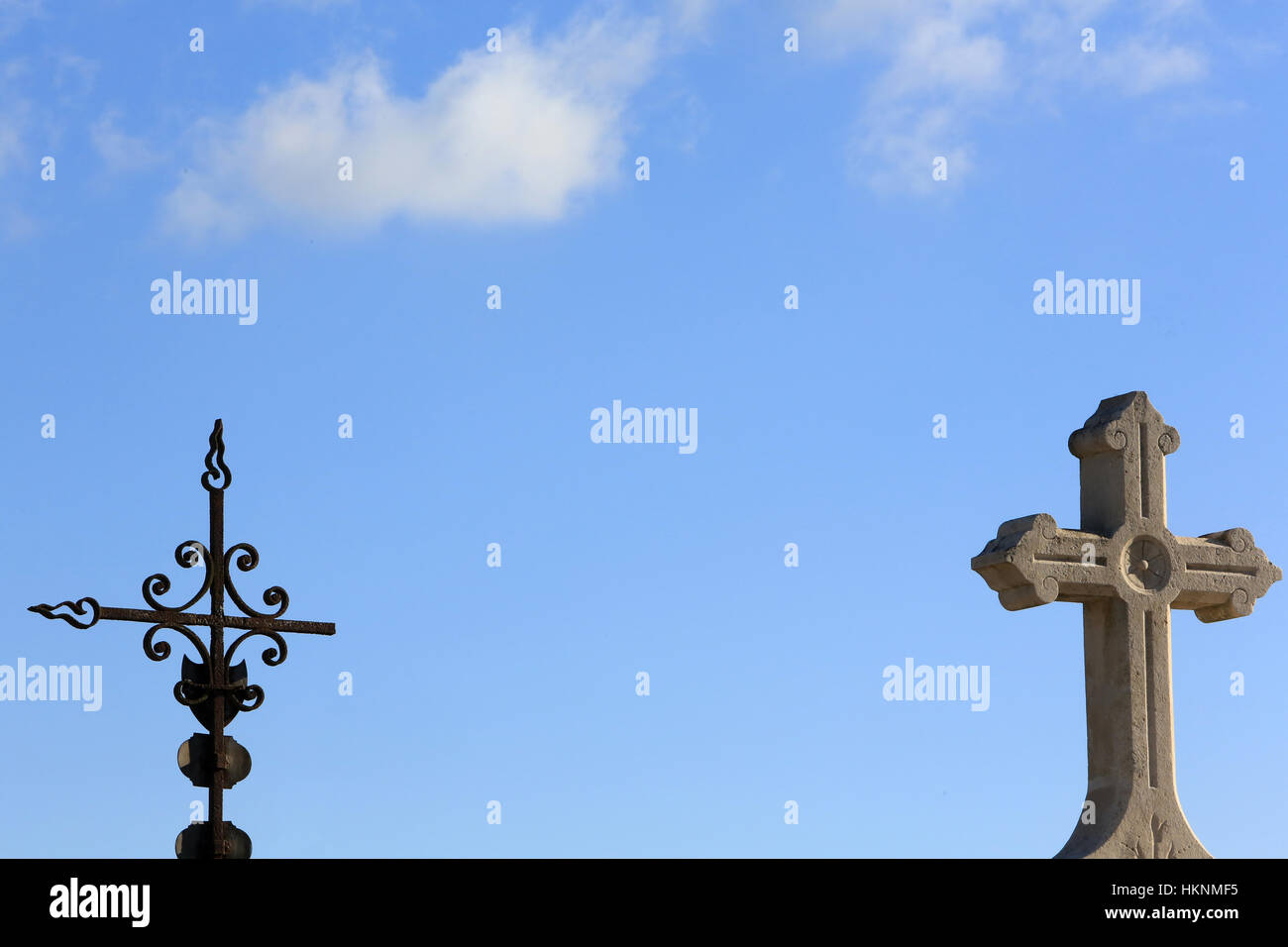 Cross in stone and wrought iron Stock Photo - Alamy