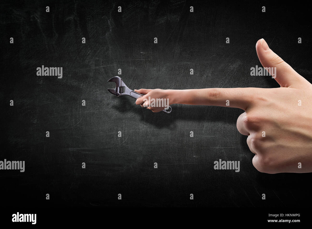 Handyman concept with person hand and adjustable wrench Stock Photo - Alamy