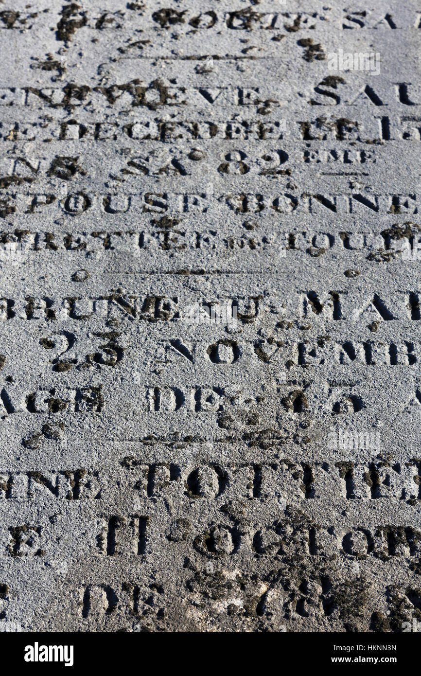 Inscriptions on a tombstone Stock Photo - Alamy