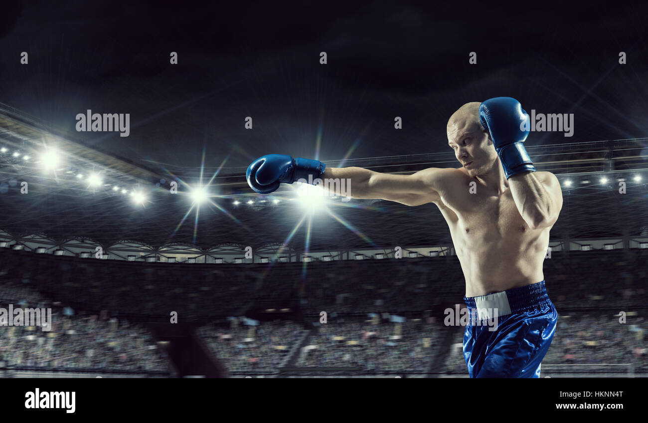 Professional box fighter on grand arena. Mixed media Stock Photo - Alamy