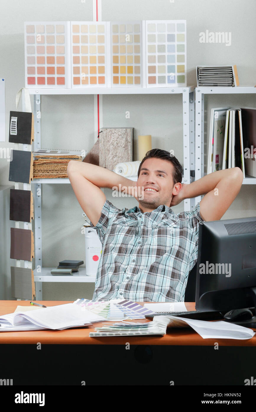 Taking a break at his desk Stock Photo - Alamy