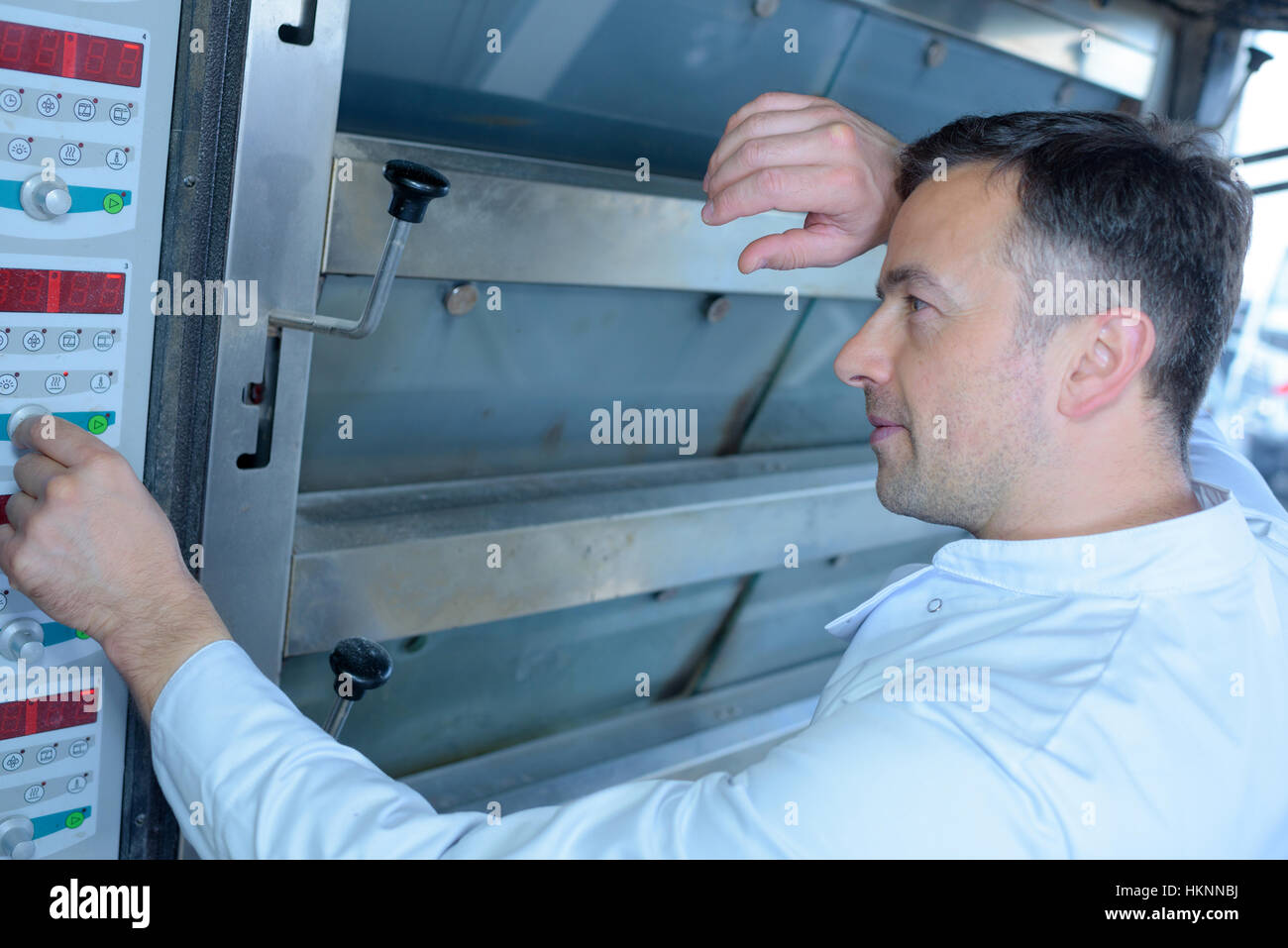 Baker setting controls on oven Stock Photo - Alamy