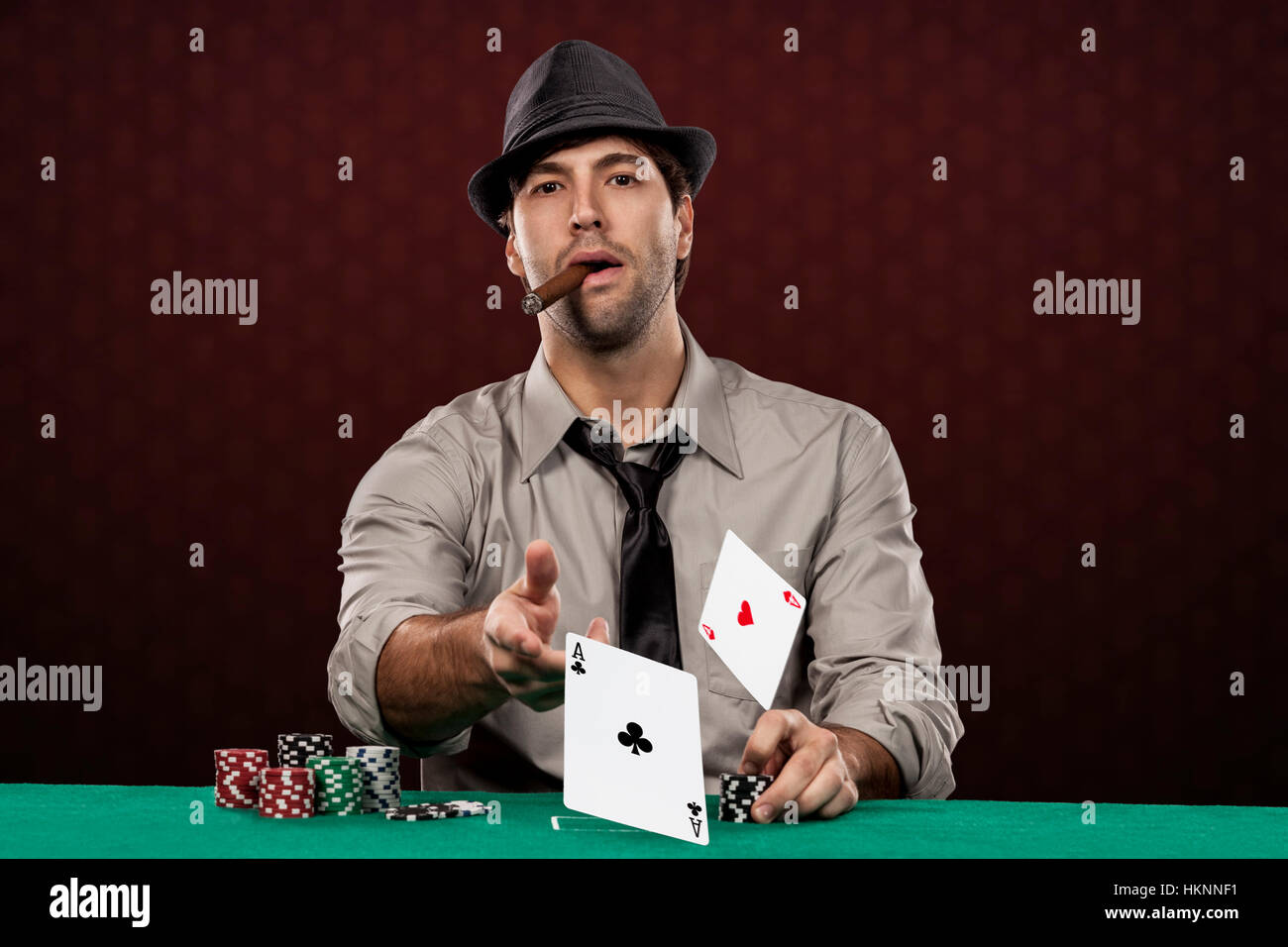 Throwing cards into hat hi-res stock photography and images - Alamy