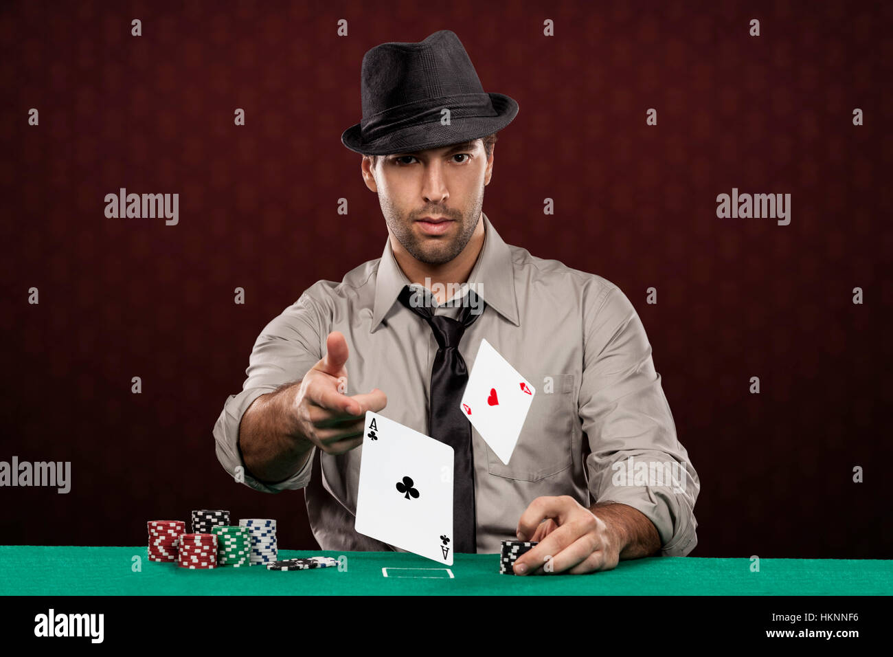 Throwing cards into hat hi-res stock photography and images - Alamy