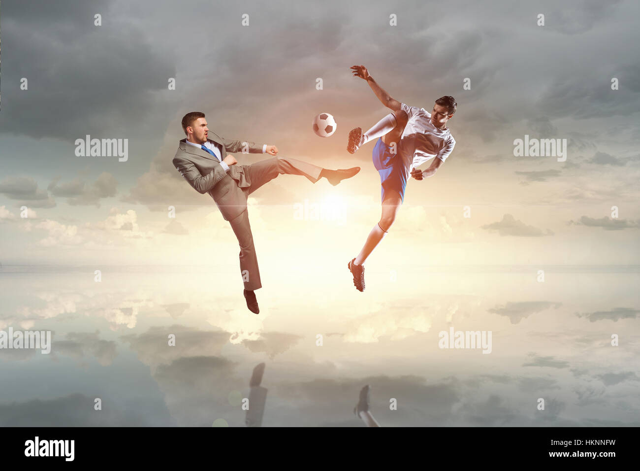 Football player with ball in action outdoors Stock Photo - Alamy