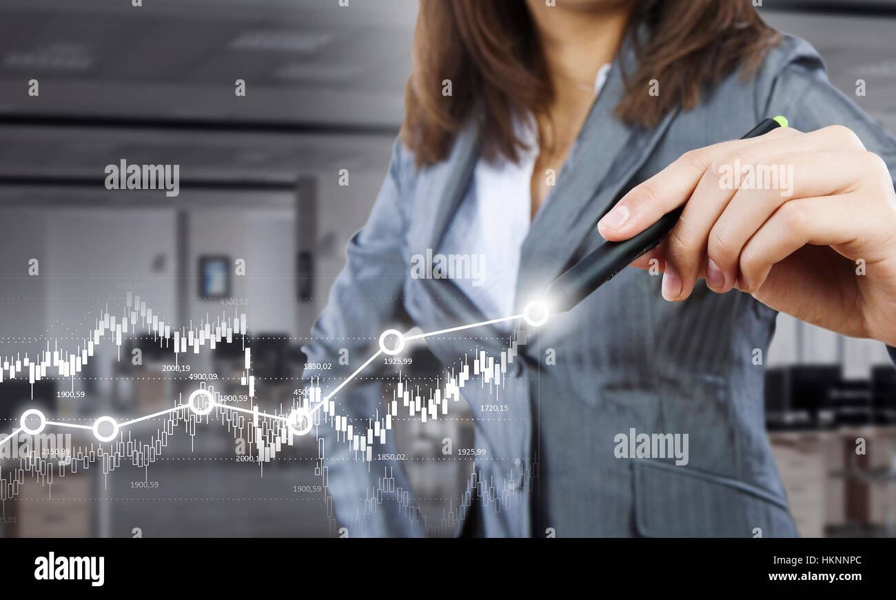 Chest view of businesswoman drawing infographs on screen mixed media hi ...