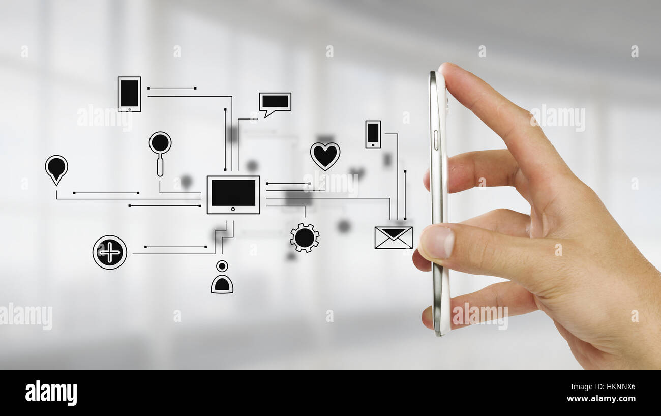 Smartphone device in hand and computing connection media concept. Mixed ...