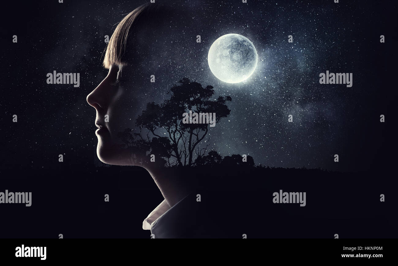 Profile of dreaming kid girl against night sky background Stock Photo ...