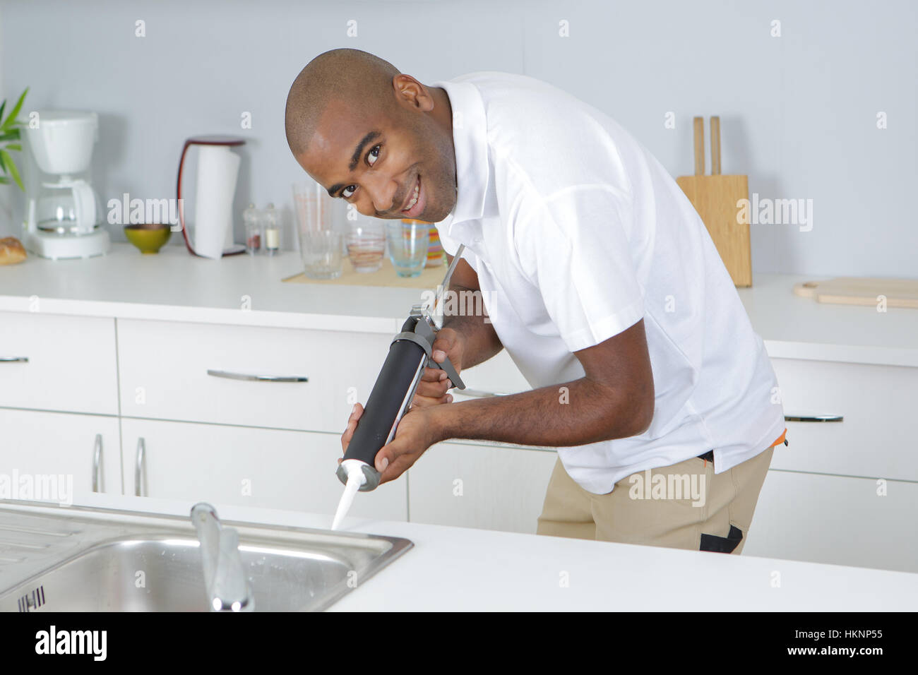 a happy handyman Stock Photo - Alamy