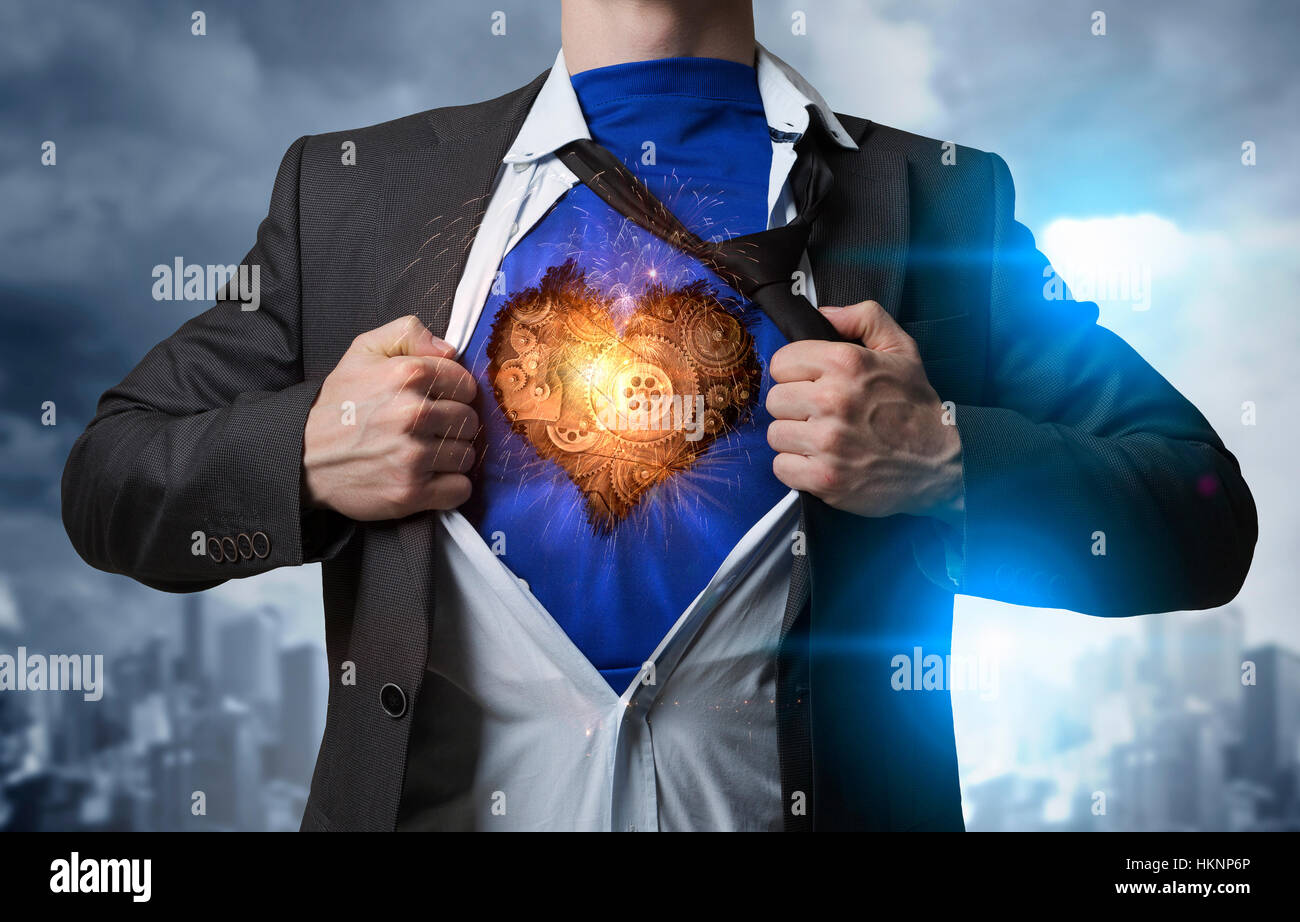 Businessman in classic pose tearing his shirt on chest Stock Photo - Alamy