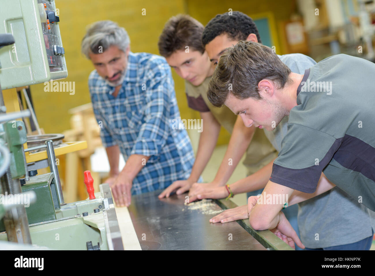 Focused young male teacher hi-res stock photography and images - Alamy