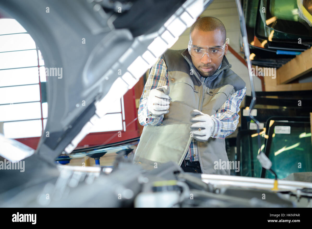 fixing a car Stock Photo - Alamy