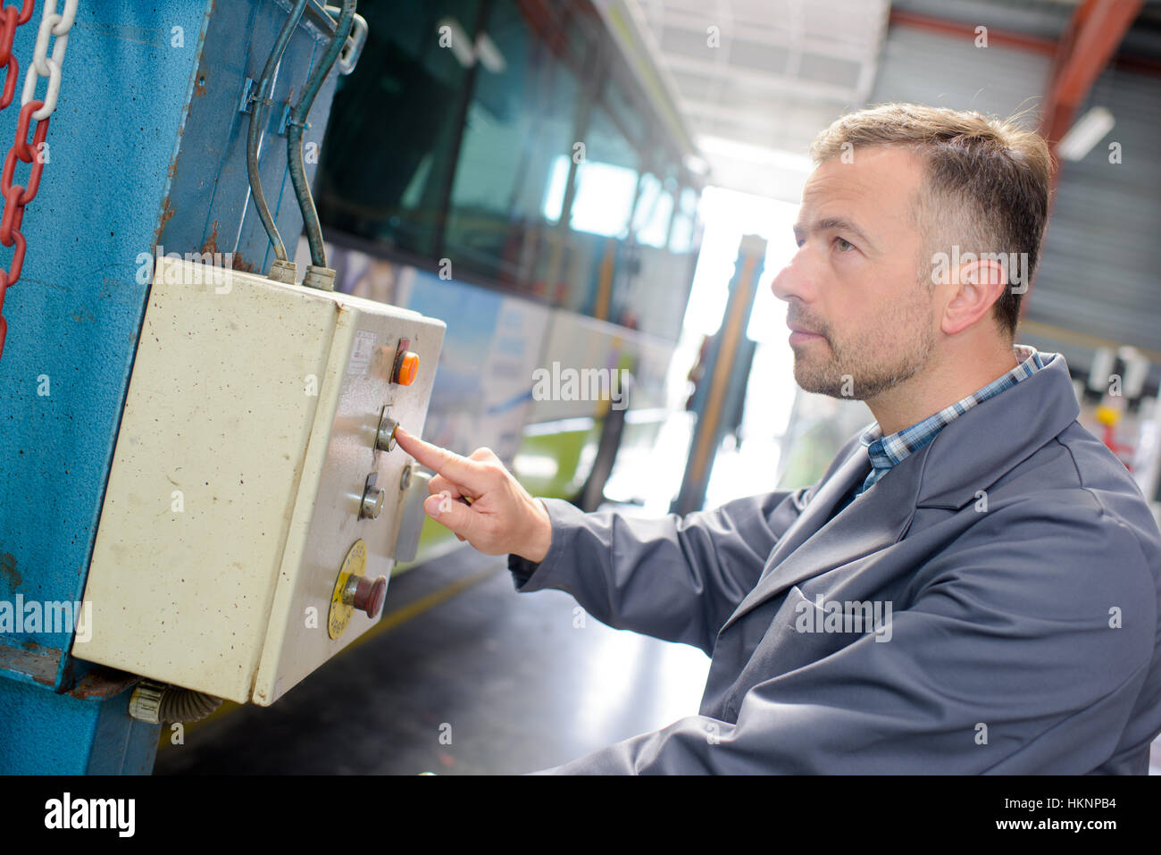 machinist operating machine Stock Photo - Alamy