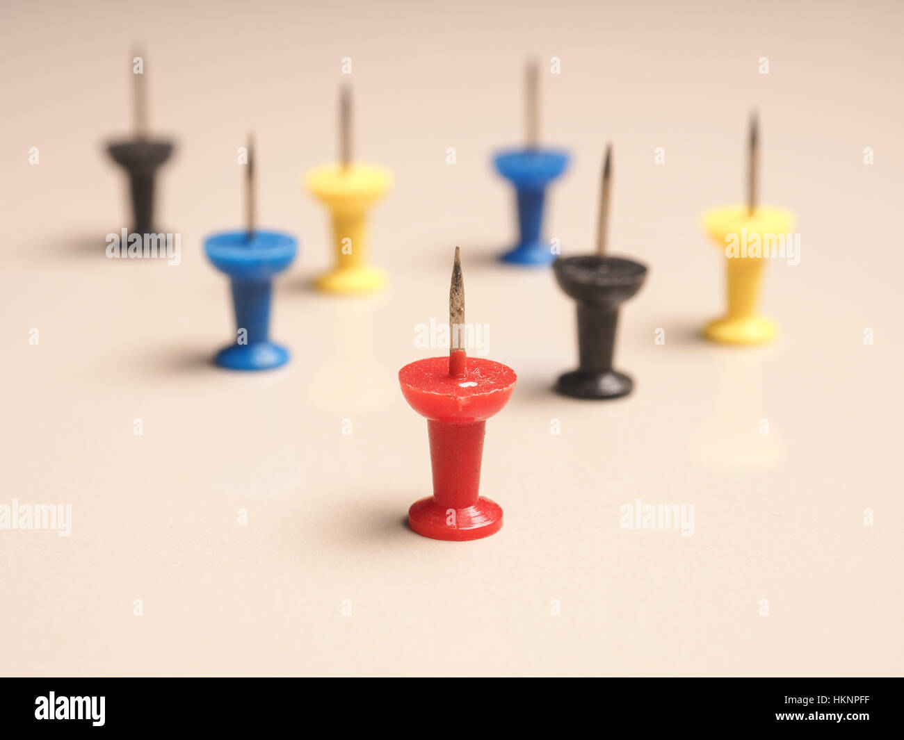 Old used push pin on a bright table Stock Photo - Alamy