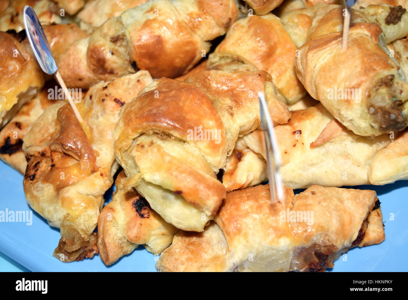 Savory croissants filled with ham, cheese and olives Stock Photo - Alamy