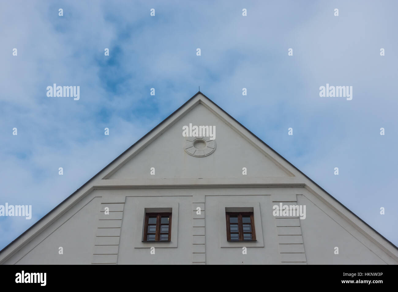 Top of a white building and blue sky Stock Photo - Alamy