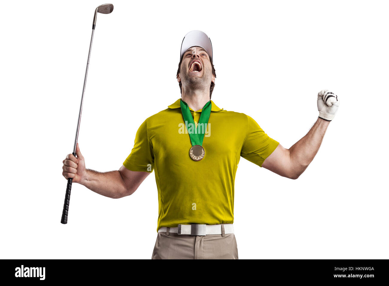 Golf Player in a yellow shirt celebrating with a golden medal, on a ...