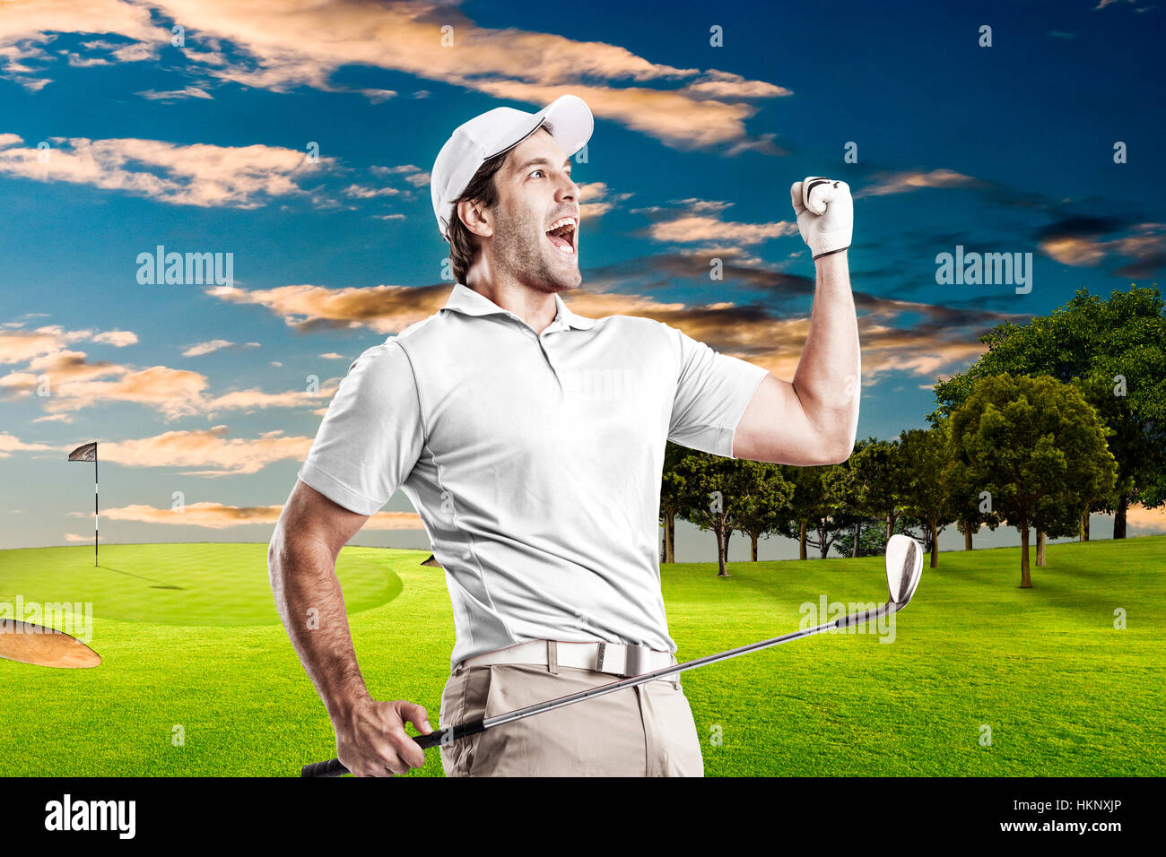 Golf Player in a white shirt celebrating, on a golf course Stock Photo ...