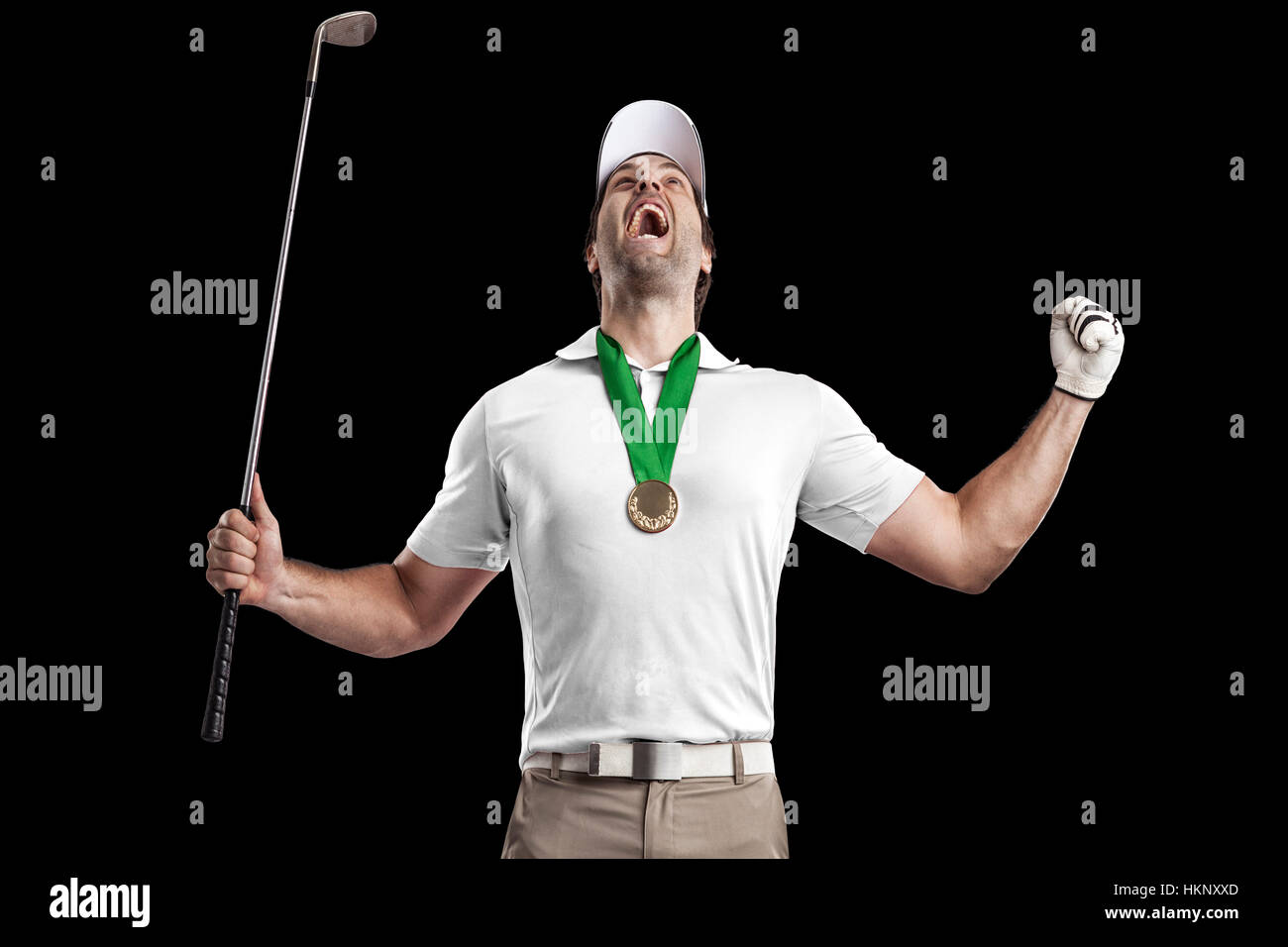Golf Player in a white shirt celebrating with a golden medal, on a ...