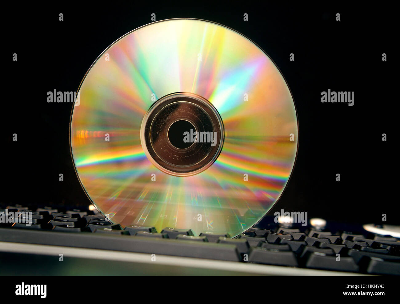 Cd rome on computer keyboard Stock Photo - Alamy