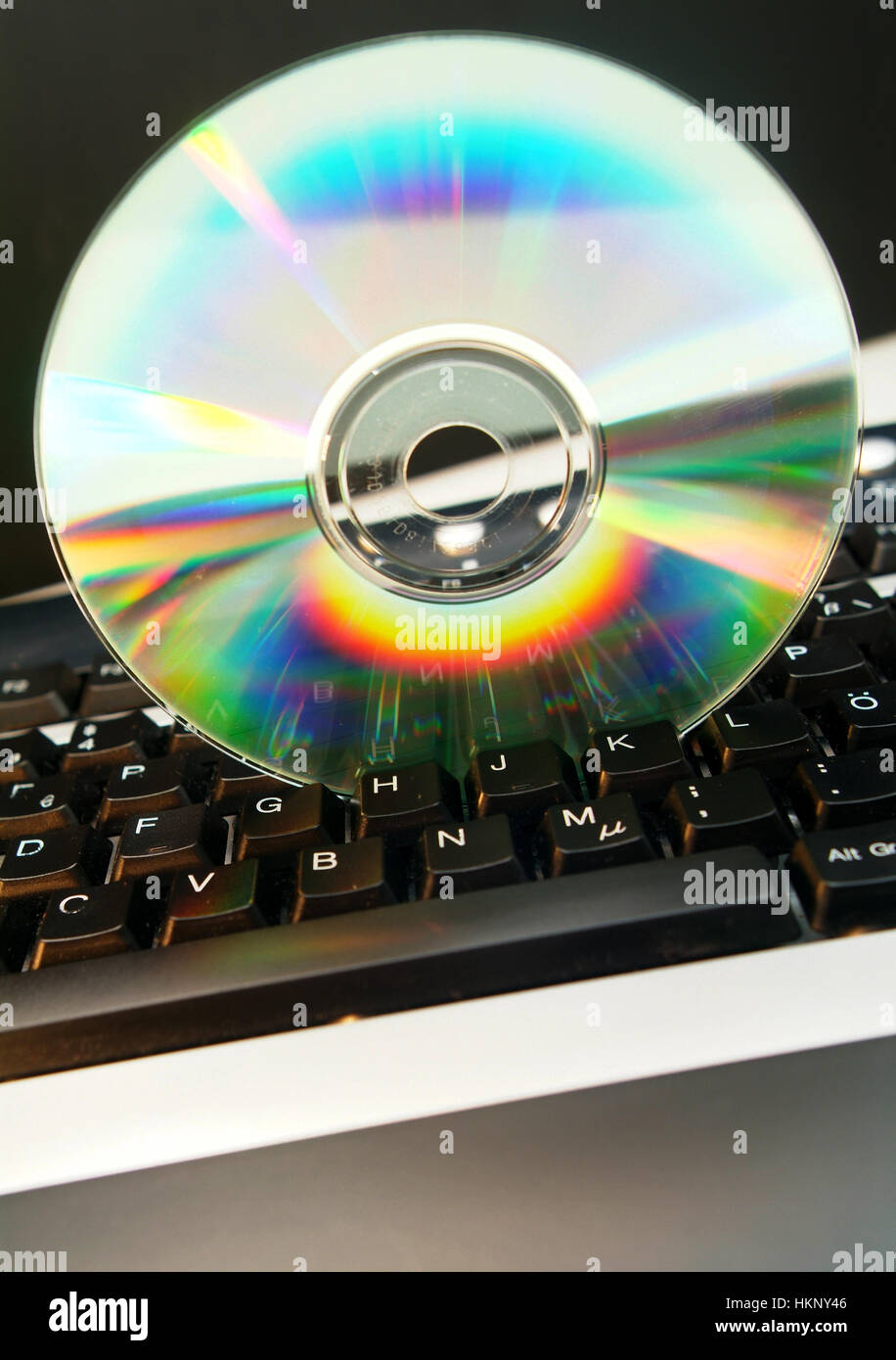 Cd rome on computer keyboard Stock Photo - Alamy