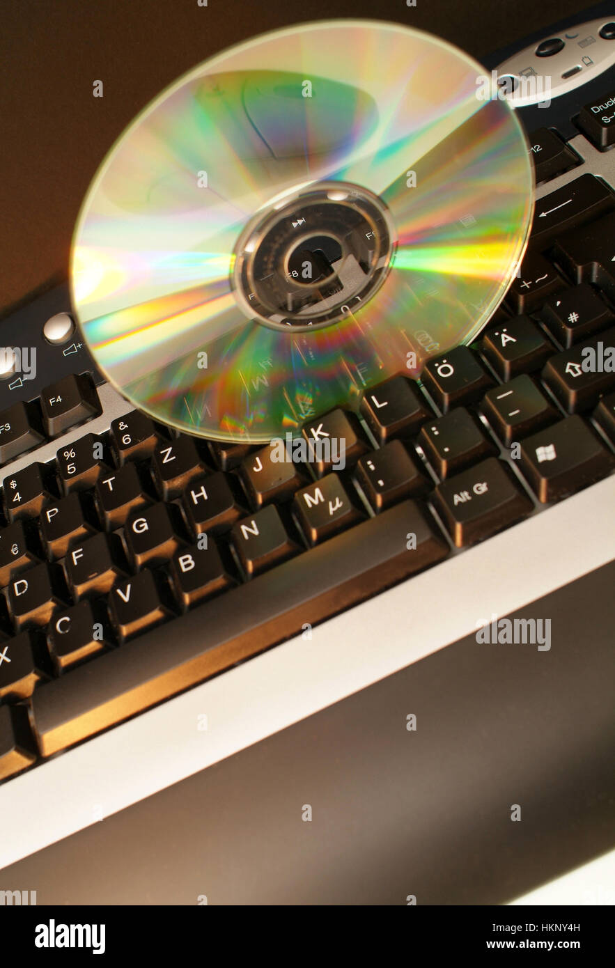 Cd rome on computer keyboard Stock Photo - Alamy