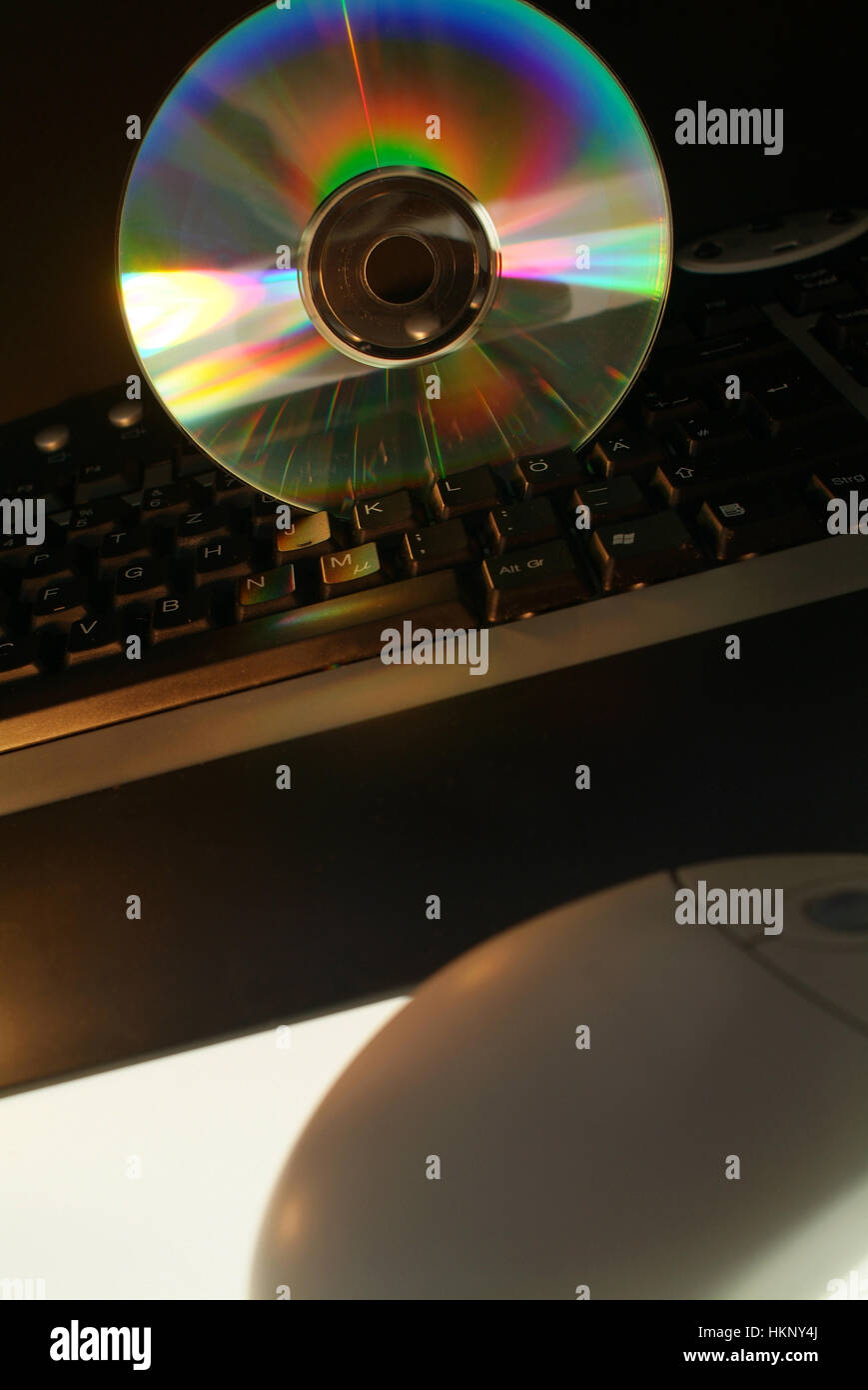 Cd rome on computer keyboard Stock Photo - Alamy